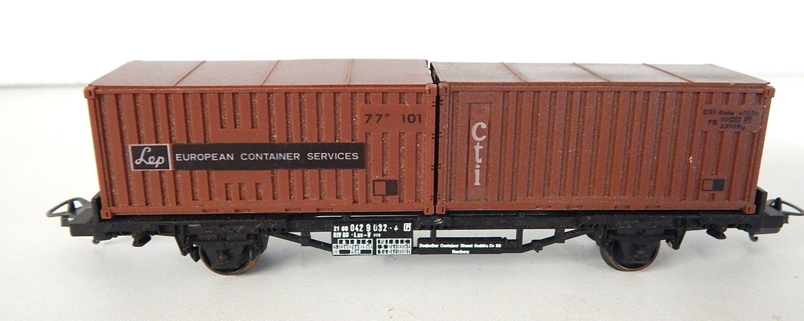 LIMA WAGON PLAT A ESSIEUX CONTENEUR MARRON HO SANS BOITE - CC2RAILS...